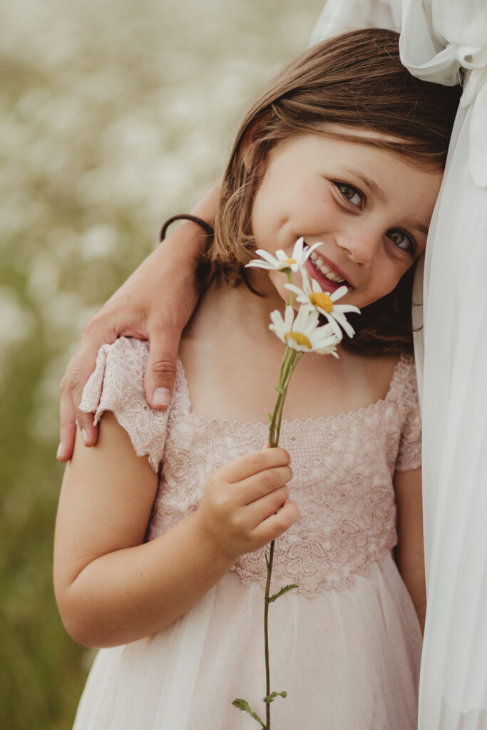 Daisy field photo shoot outdoors after a storm - and then she clicked
