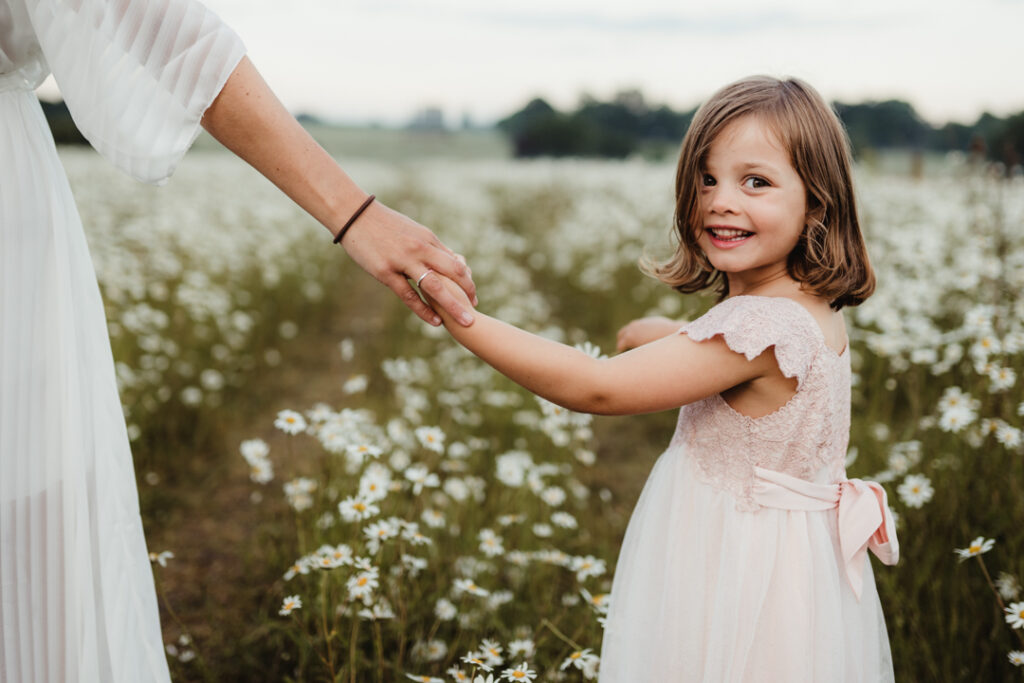 Daisy field photo shoot outdoors after a storm - and then she clicked
