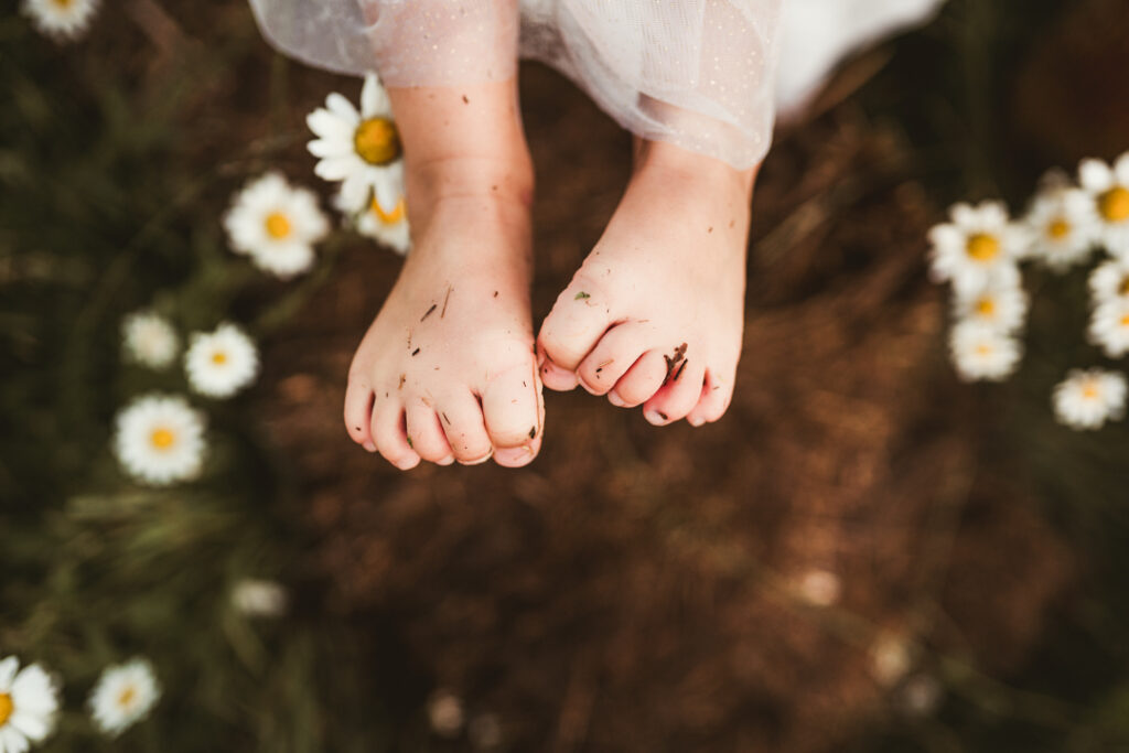 Daisy field photo shoot outdoors after a storm - and then she clicked