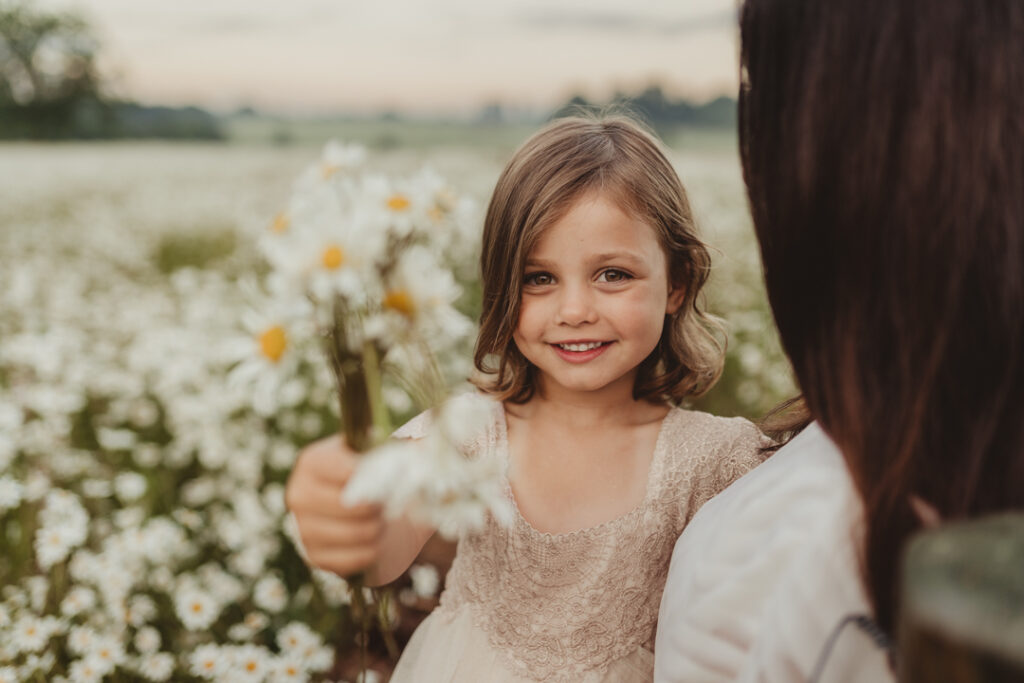 Daisy field photo shoot outdoors after a storm - and then she clicked