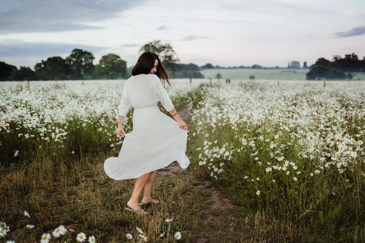 Daisy field photo shoot outdoors after a storm - and then she clicked