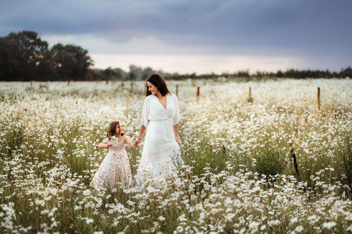 Daisy field photo shoot outdoors after a storm - and then she clicked